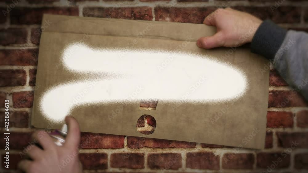 Question mark symbol spray painted on the brick wall. Graffiti art ...