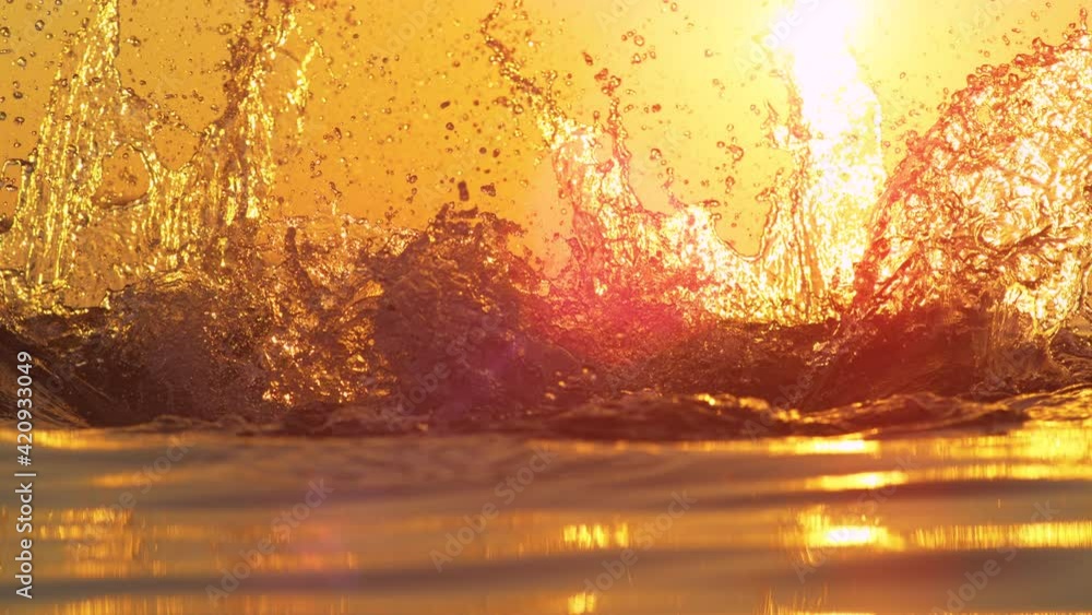 SLOW MOTION, LENS FLARE, CLOSE UP, DOF: Detailed shot of crystal clear ...