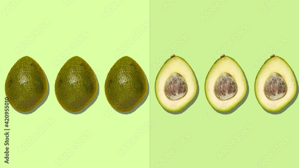 Stop motion animation Ripe whole green avocados move from left to right ...
