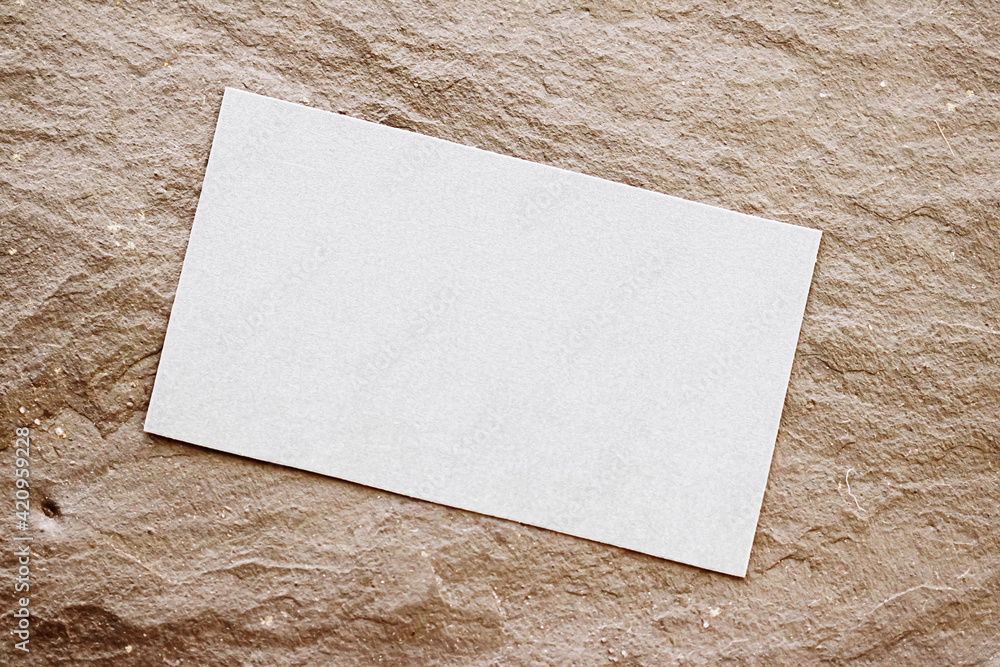 White business card flatlay on brown stone background, luxury branding ...