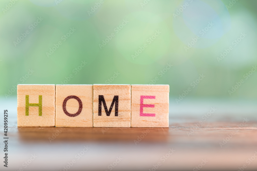 Words concept, HOME word cube on bokeh blur background ,English ...
