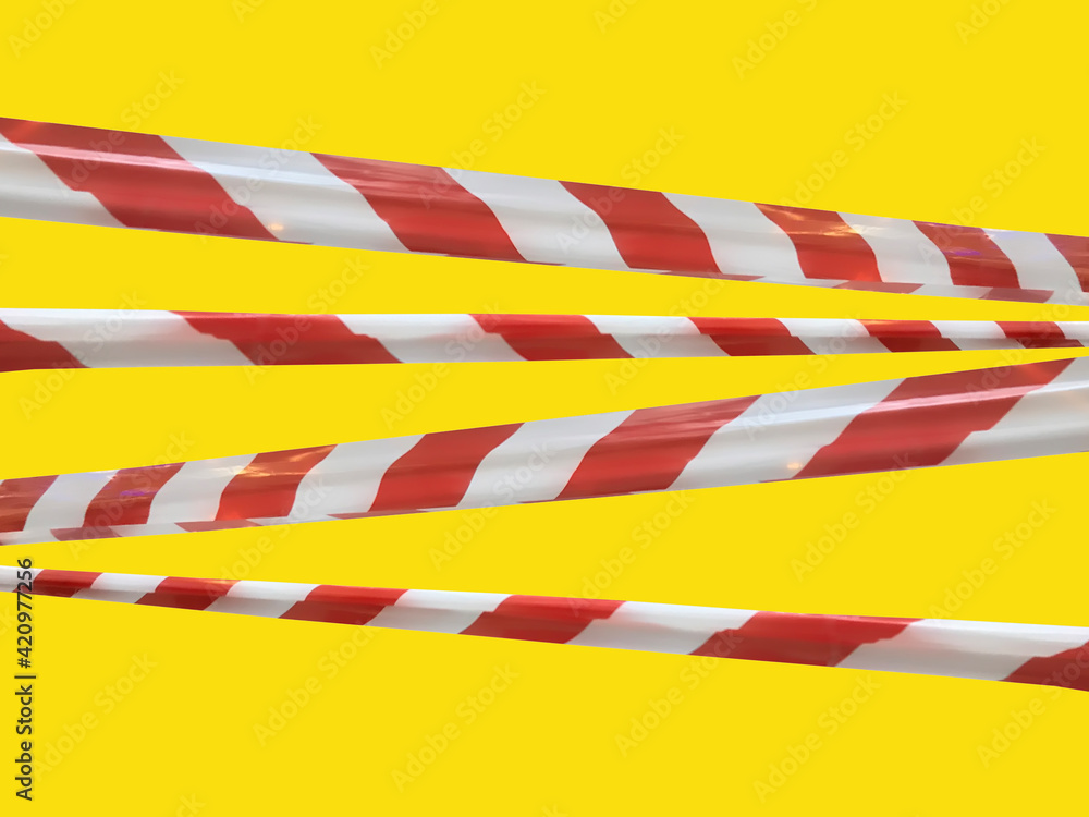Red and white warning lines of barrier tape prohibit passage. Barrier ...