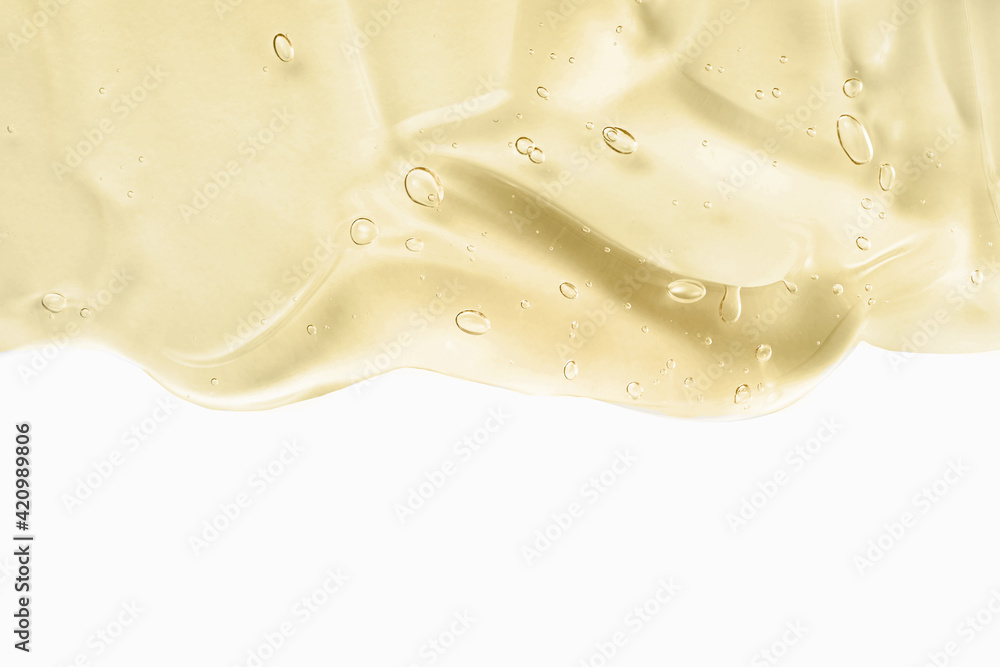 Cosmetic cream transparent liquid gel. Yellow gel smudge isolated on ...