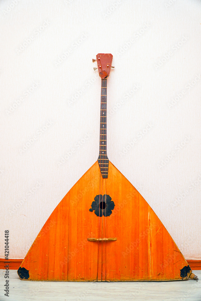 Three-string traditional national Russian musical instrument bass ...