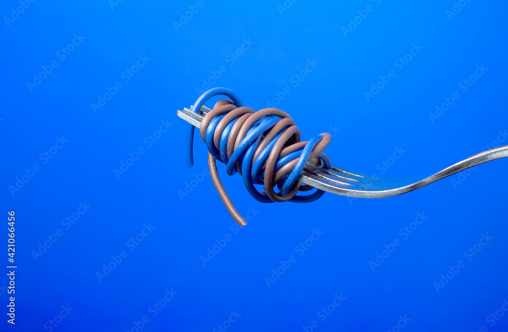 Plug with wires on a blue background. Tasteful internet. Stock Photo ...