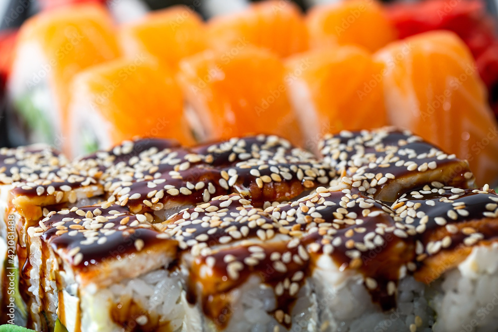 Tray with freshly prepared rolls, side view. Food from the delivery ...