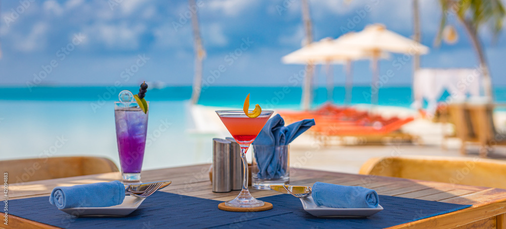Luxury resort hotel poolside, outdoor restaurant on the beach, ocean ...