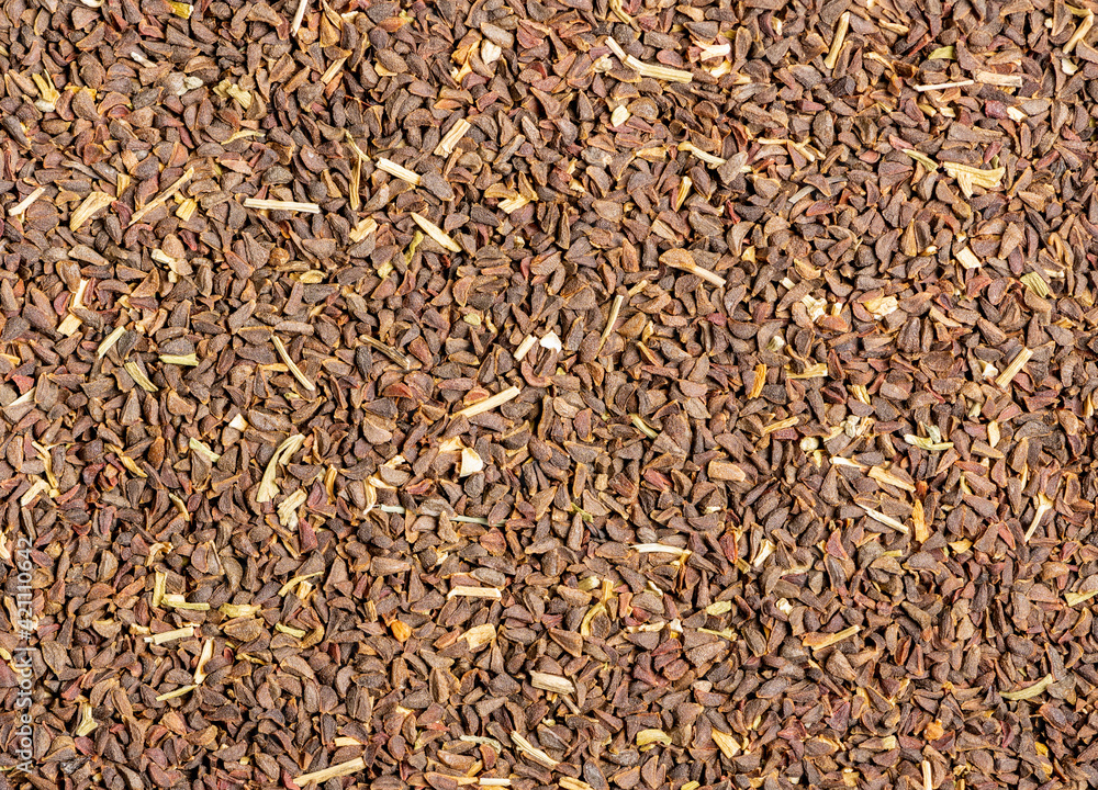 Peganum seed texture. Also known as peganum harmala or wild rue. It is ...