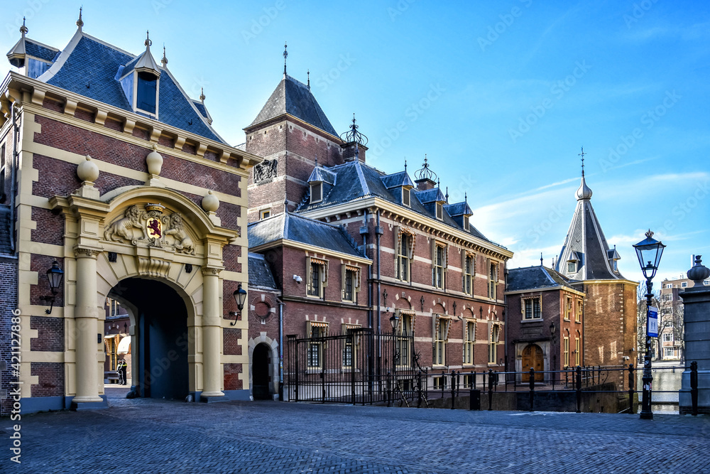Entrance gate to the parliament building, Binnenhof, with a view to the ...