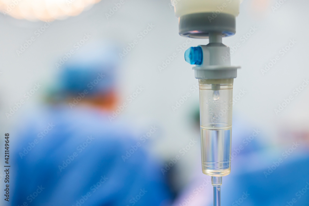 Intravenous fluid infusion during advance surgery inside operating room ...