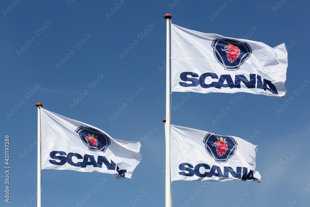 Vejle, Denmark - September 10, 2016: Scania flags waving in the sky ...