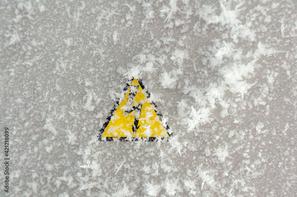 Arrow danger sign, Electricity Hazard Power symbol, frozen and covered ...