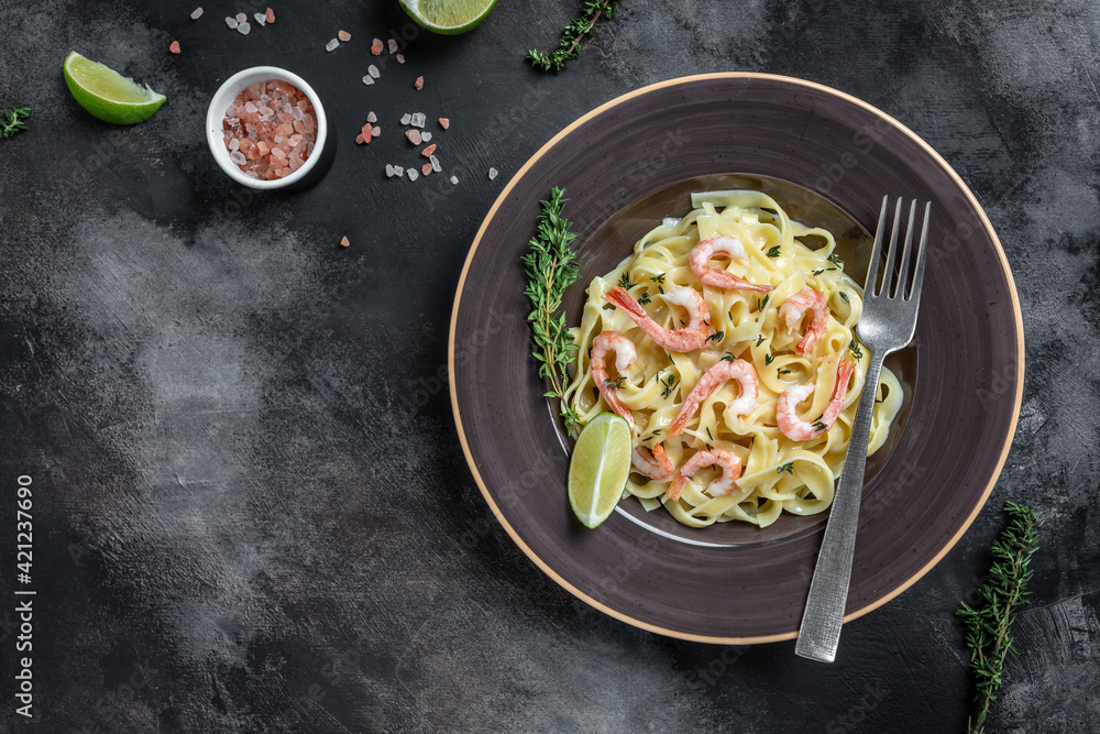 Pasta with shrimps in creamy garlic sauce, fettuccine pasta, italian ...