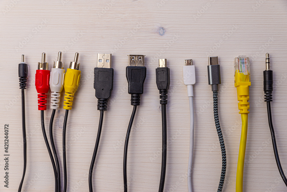 Various types of plugs and cables for audio, video, computer ...
