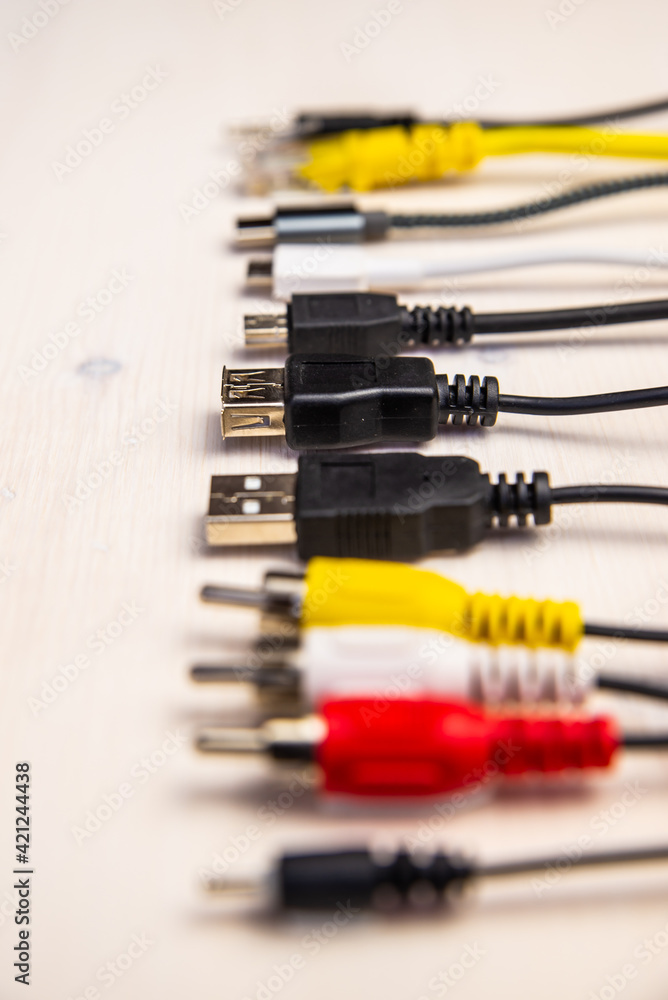 Various types of plugs and cables for audio, video, computer ...