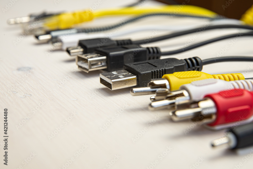 Various types of plugs and cables for audio, video, computer ...