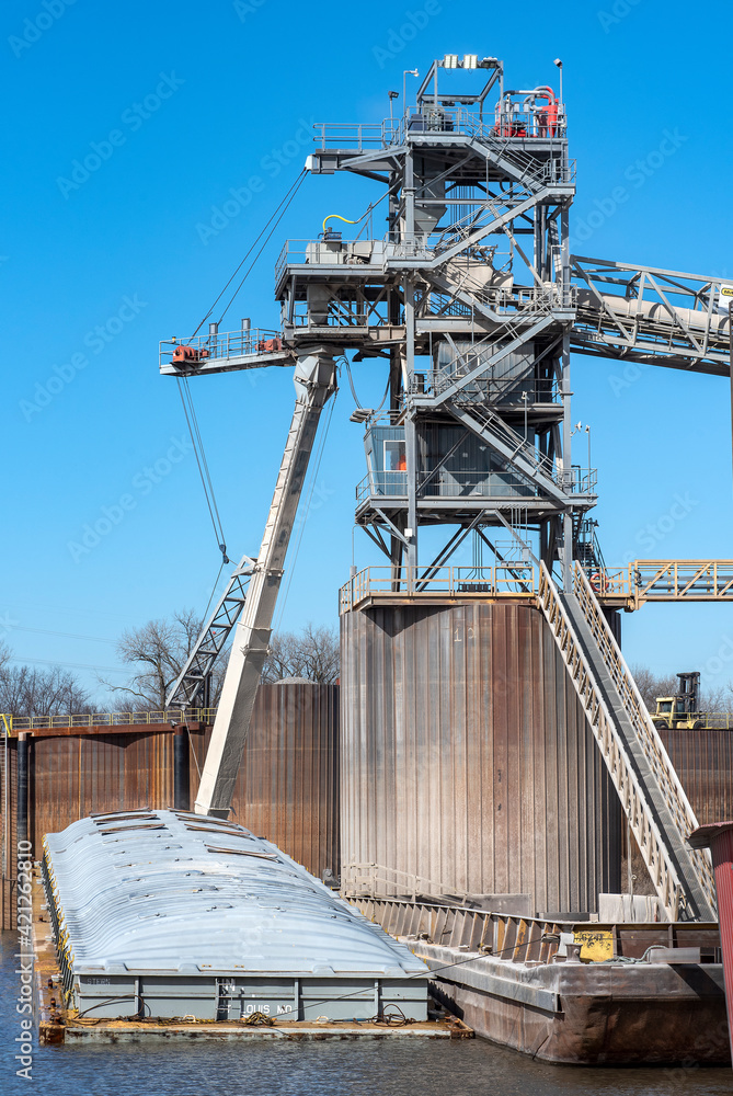 Grain elevator terminal barge spout loading grain corn into barge on ...