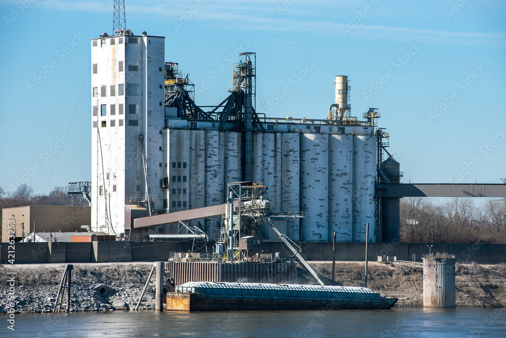 Grain elevator terminal spout loading grain corn into bulk dry cargo ...