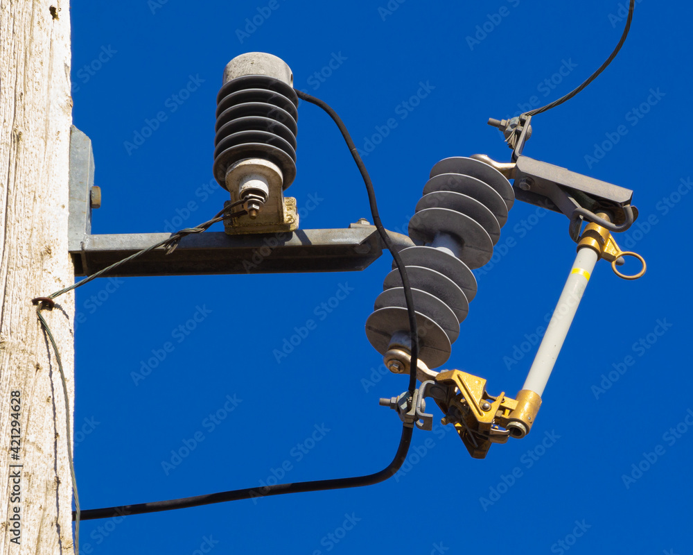 Telephone or utility power pole fuse and surge protector Stock Photo ...