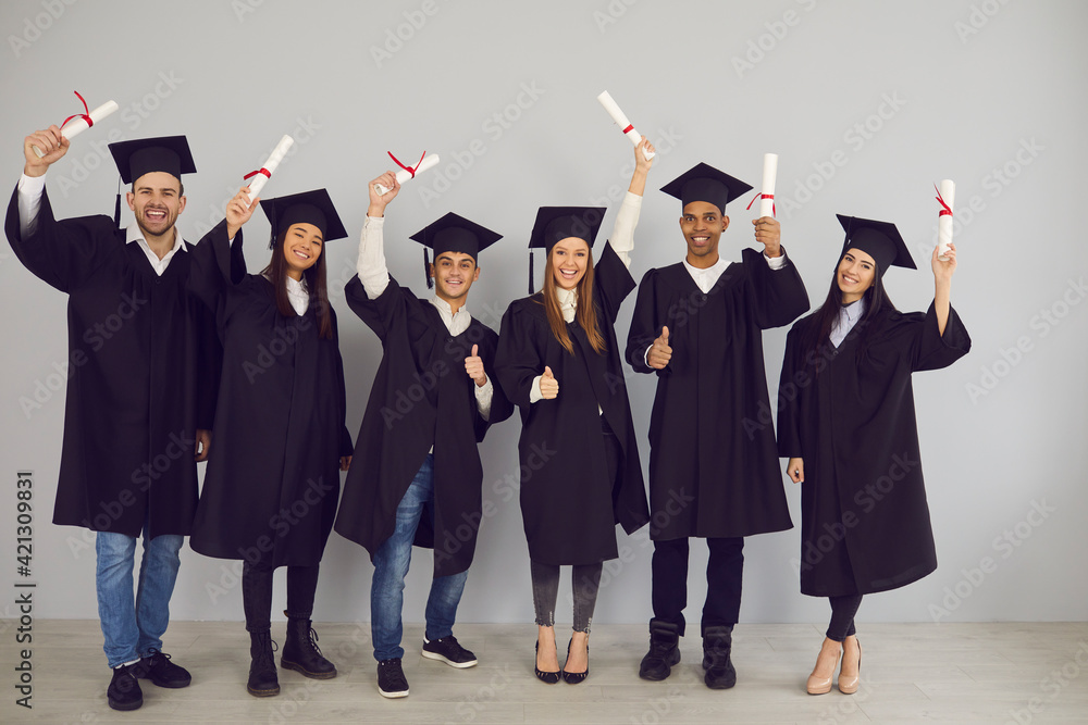Group of cheerful multiethnic university graduates mixed race ...