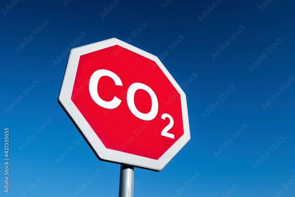 Stop traffic sign demanding the CO2 carbon dioxide emmisions from ...