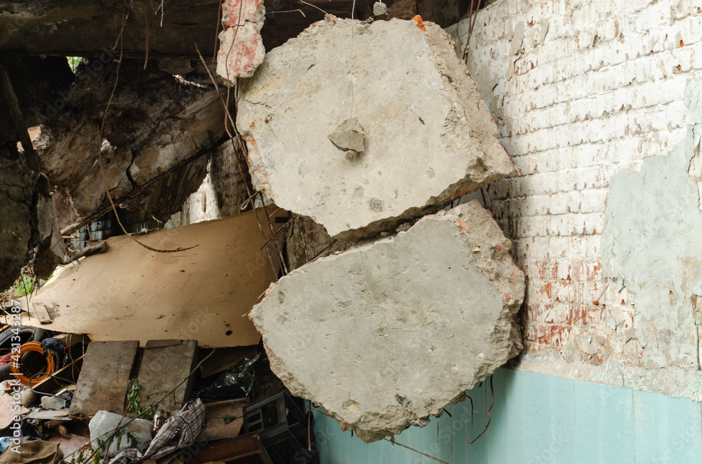 Broken concrete slab close-up, fallen when disassembling a large ...
