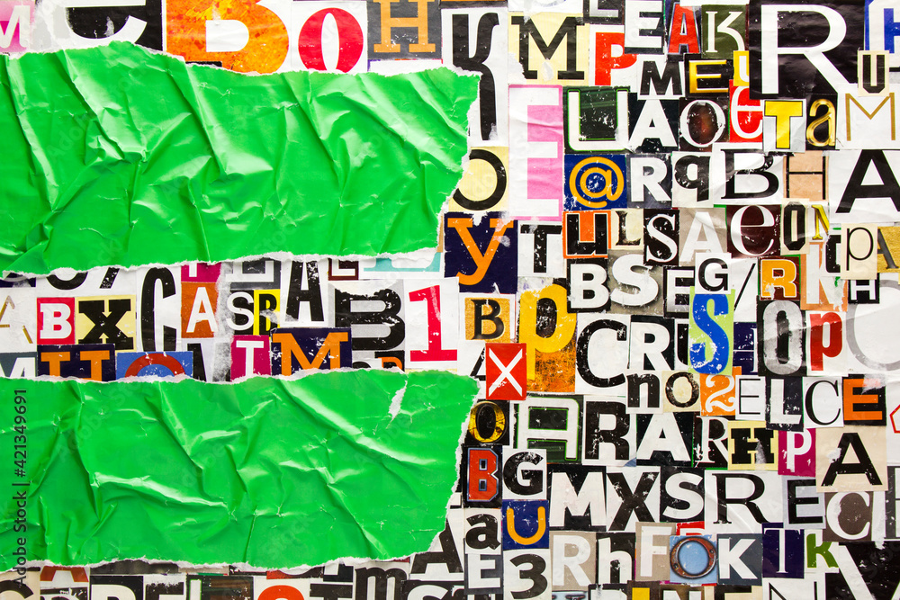 Torn and crumpled pieces of green paper on collage from clippings with ...