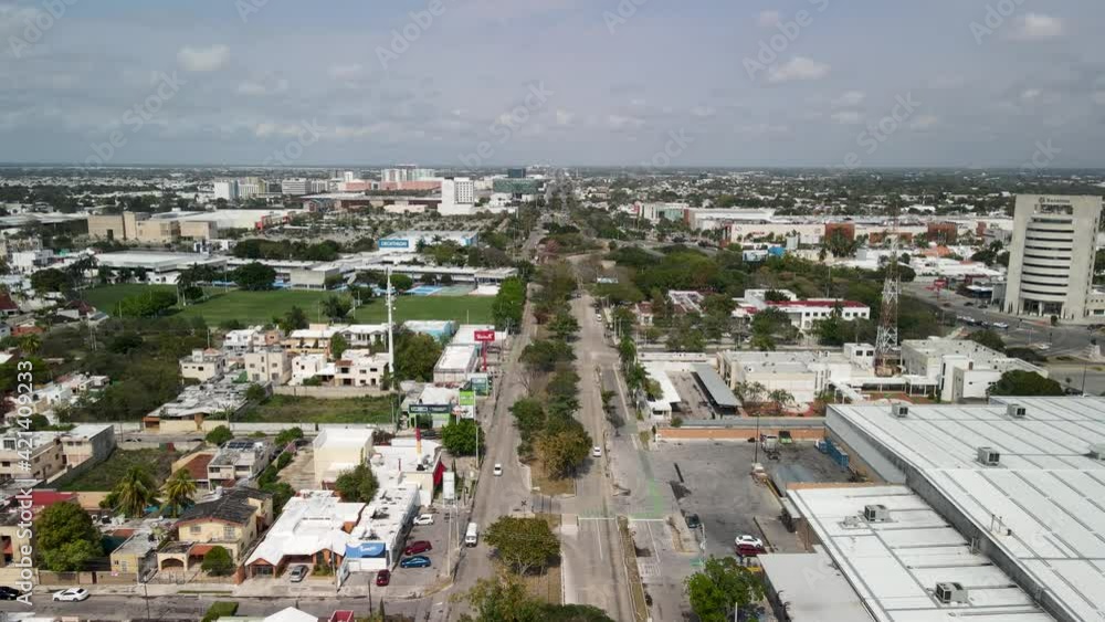 Aerial view of avenue in Merida Yucatan with railroad in the middle ...