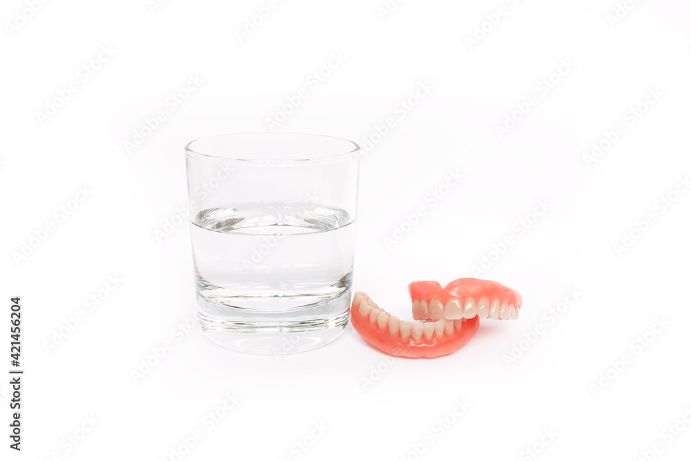 Isolated denture on a white background. Dental prosthesis care. Full ...