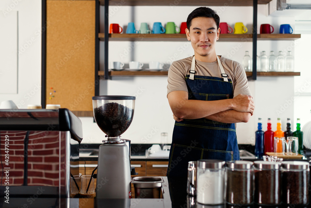 Asian short black hair young successful handsome male barista wear ...
