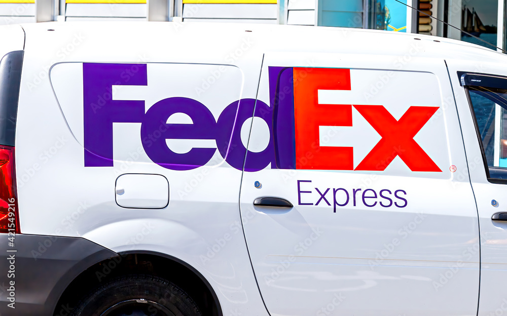 FedEx express logo on the vehicle board Stock Photo | Adobe Stock