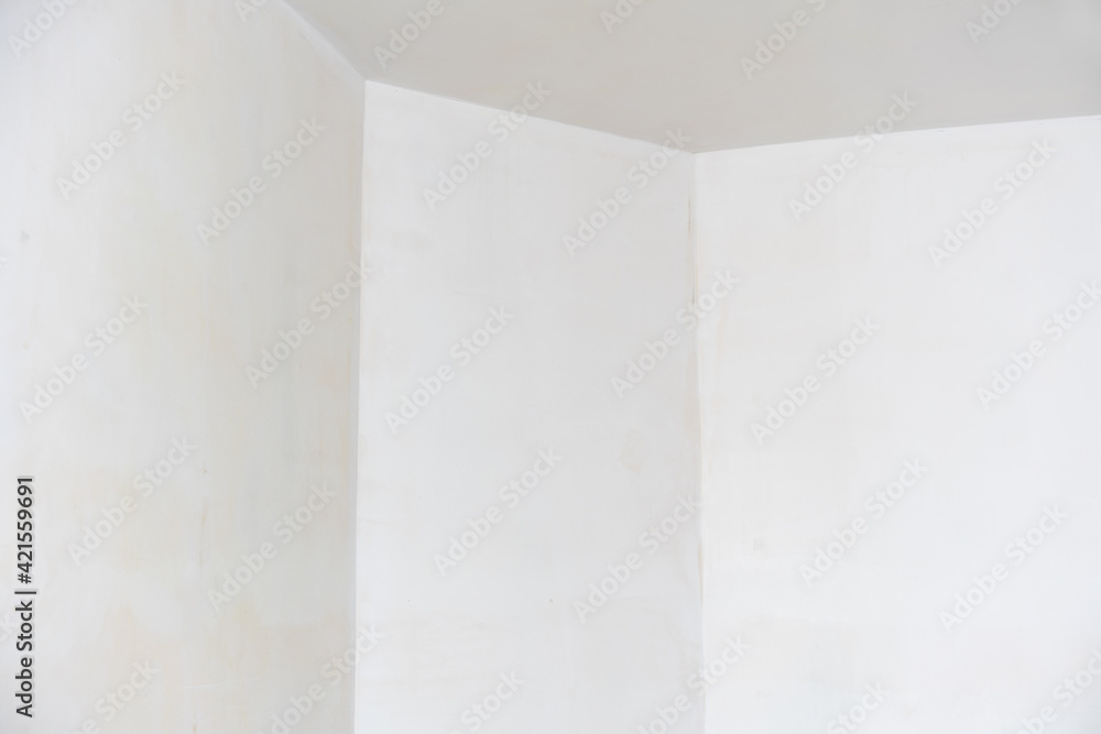 Corner of white room with non standard obtuse corners. Custom design of ...