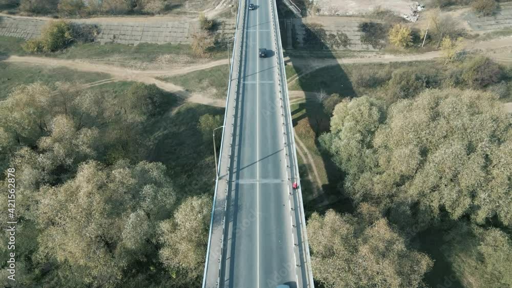 Driving on a narrow road from a birds eye view. Top-down view of the ...