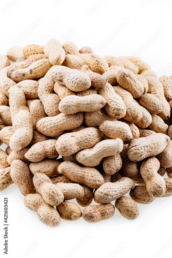 Peanuts in shells. Pile of raw peanuts in shells. Organic peanuts in ...
