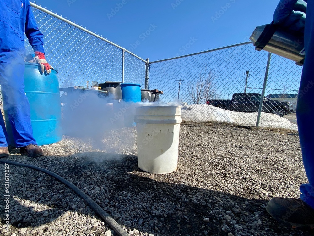 Mist being released from a chemical reaction at an LNG plant Stock 사진 ...