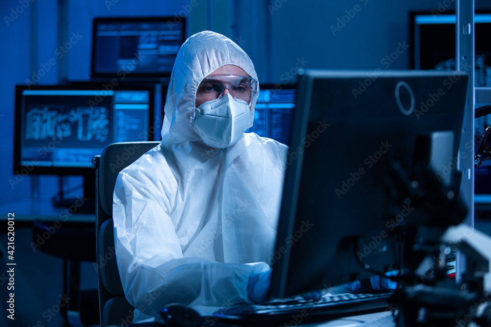 Microelectronics engineer works in a modern scientific laboratory on ...