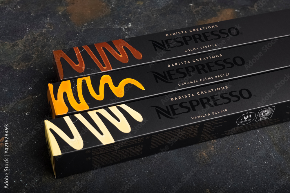 Set of nespresso coffee with various flavors on a dark background ...