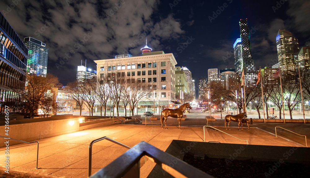 Calgary Alberta Canada, March 15 2021: A quiet downtown plaza at night ...
