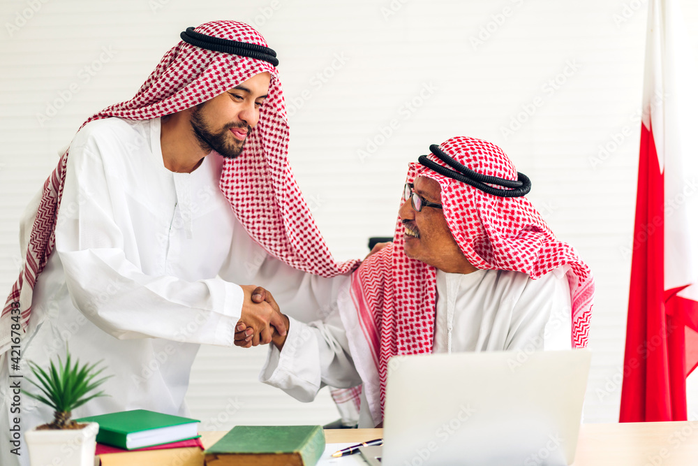 Successful of arab business partner handshake together in modern office ...