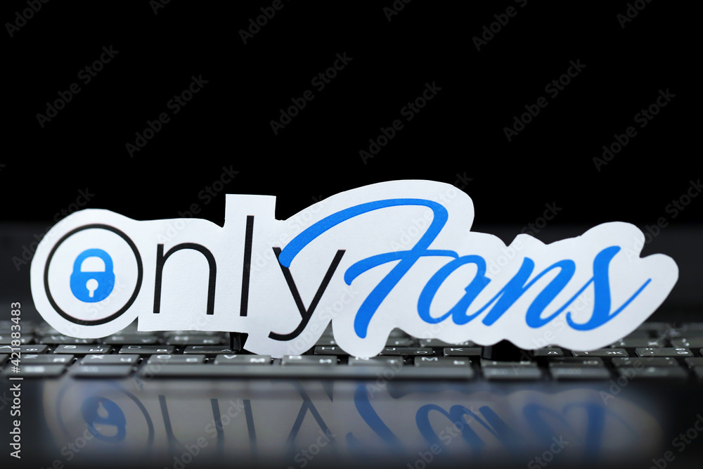 KHARKOV, UKRAINE - FEBRUARY 14, 2021: Onlyfans paper logo on black ...