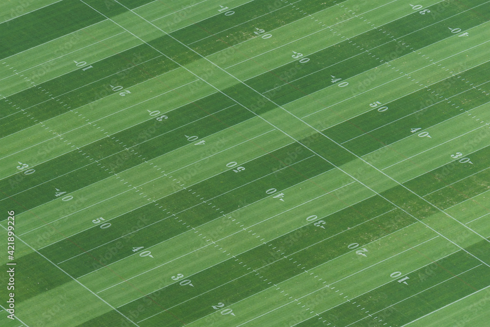 American football field aerial view. Field of play with yard marks and ...