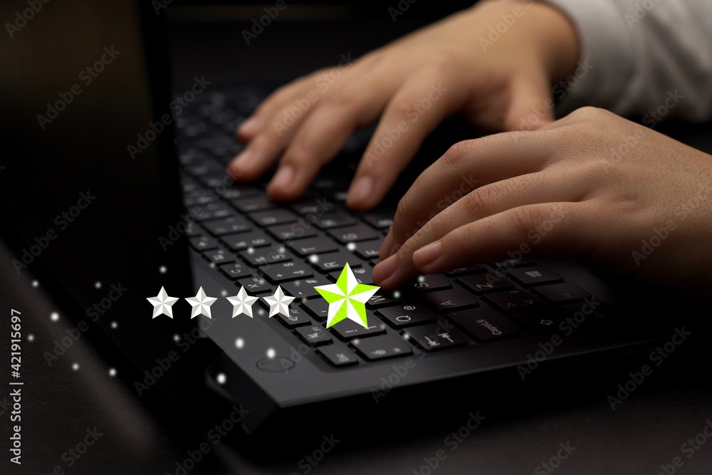 up on customer man hand typing on keyboard laptop to giving good score ...