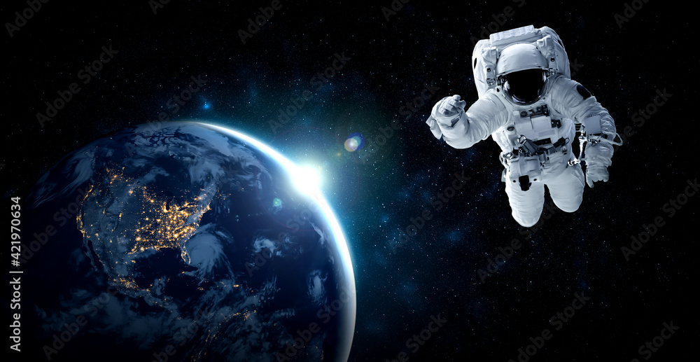 Astronaut spaceman do spacewalk while working for space station in ...