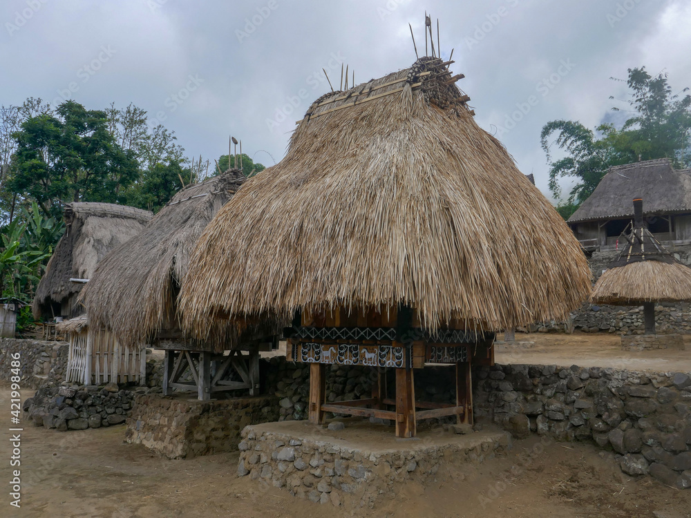Traditional bhaga huts or female ancestor symbol of the Ngada people or ...