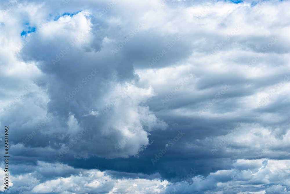 Stunning dramatic cloudy sky. Breathtaking storm clouds. Blue and grey ...