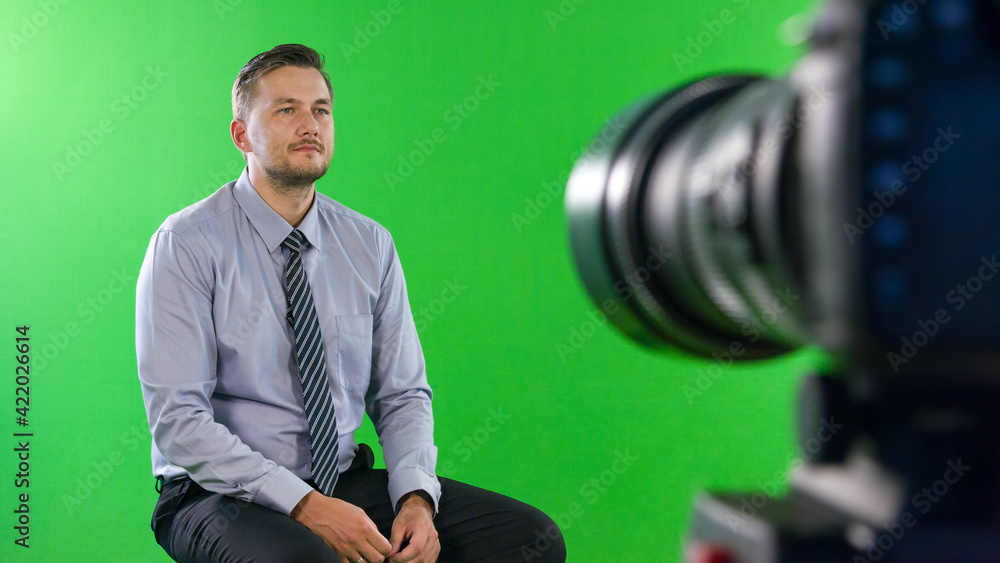 Recording interview with politician using professional tv green screen ...
