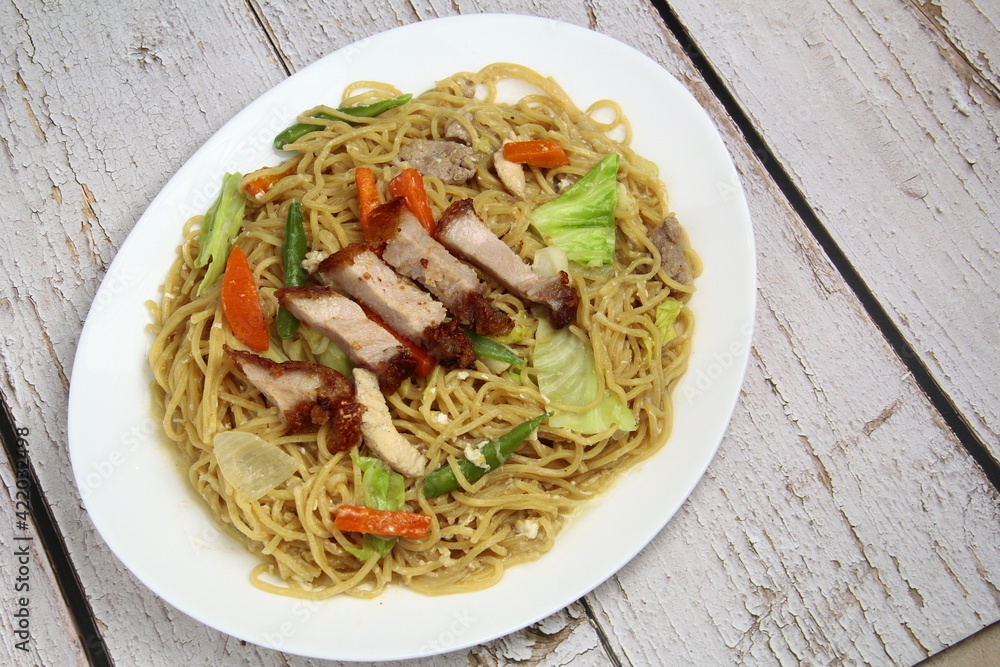 Freshly cooked Filipino food called Pancit Canton Stock Photo | Adobe Stock