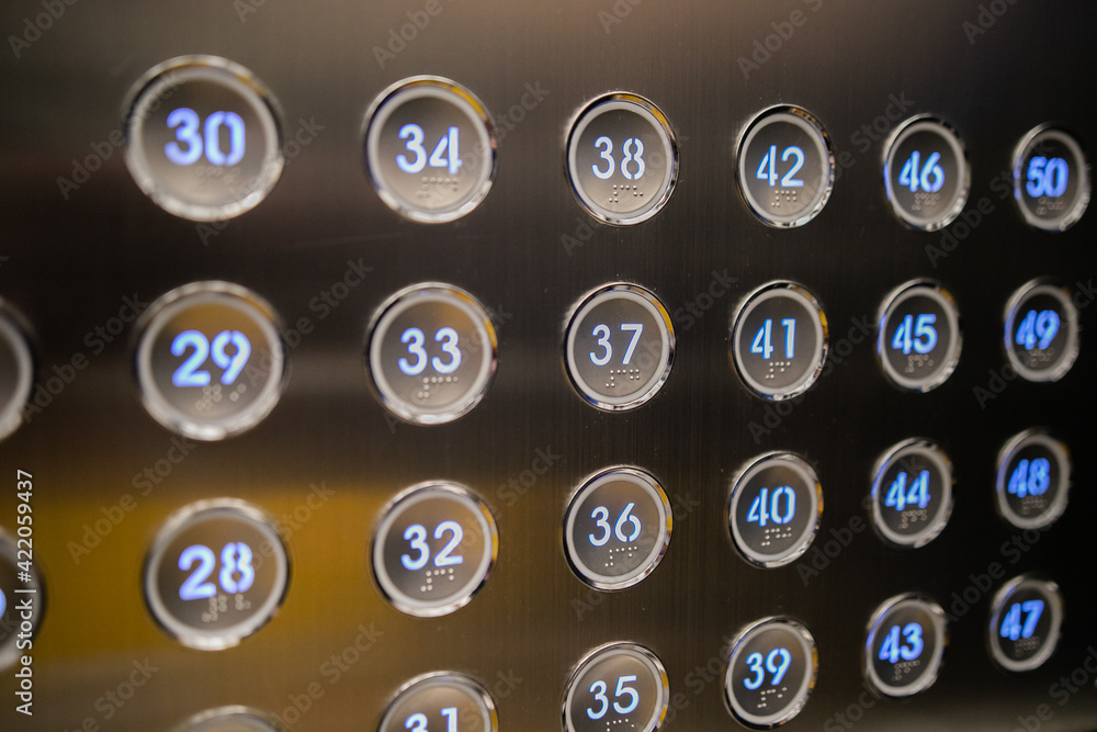 Car/cabin operating panel (COP) of elevator. Elevator call buttons ...