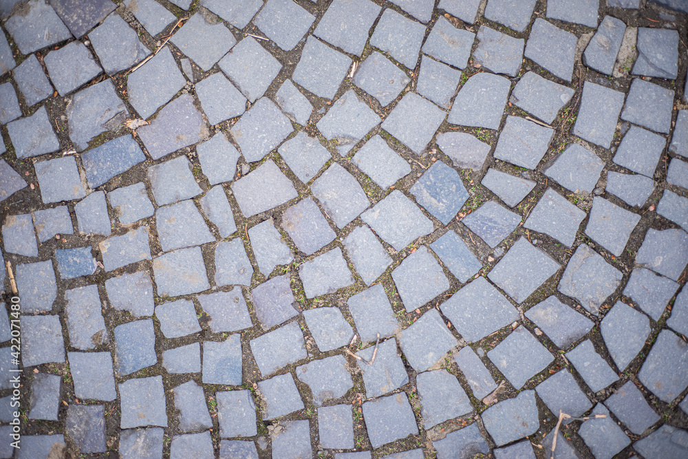 stone pavement texture, Old square stone tiles on the road and sidewalk ...