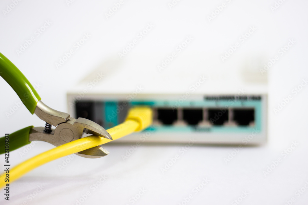 Network cable is plugged into router. Yellow cable in Wi-Fi router ...